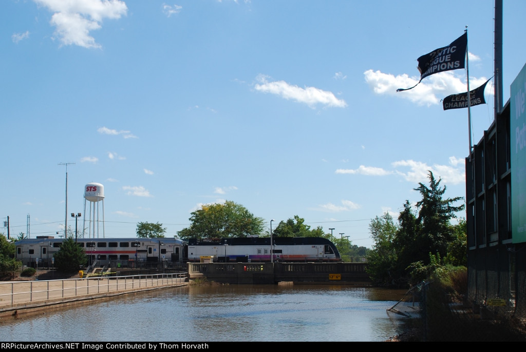 NJT train 5522 heads east over a flooded underpass from Ida